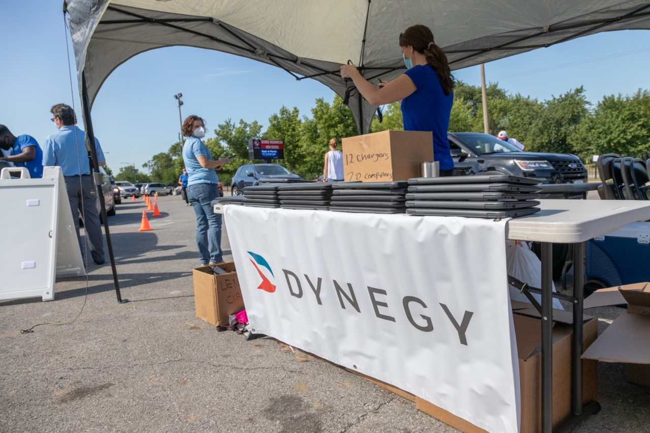 Dynegy and Comp-U-Dopt Partner to Provide Technology Access